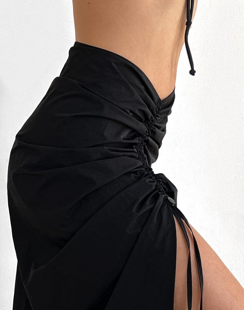 Спідниця з затяжкою довжини міді чорна купити в Києві Спідниці в магазині Rikky Hype